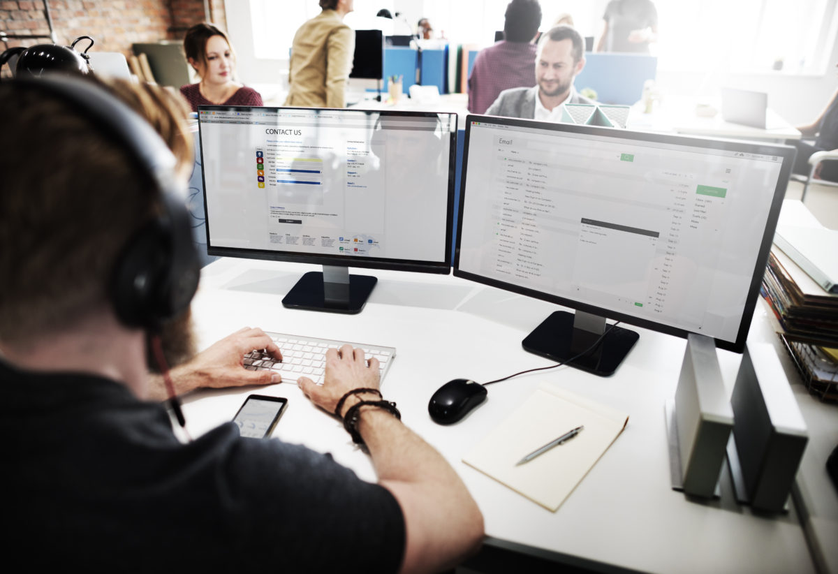 tech_on_phone | Helion Technologies